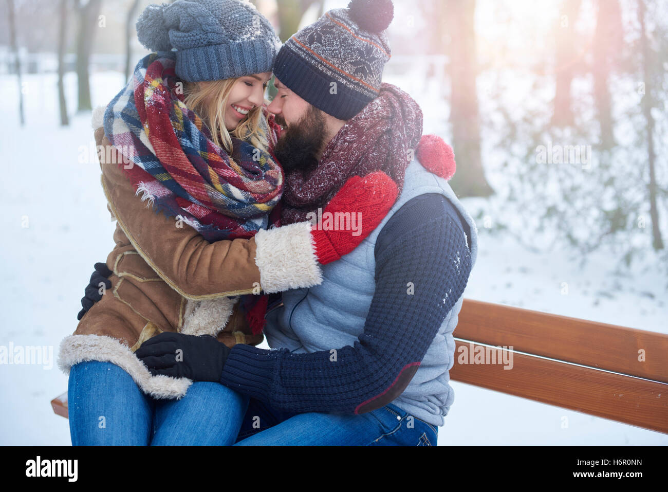 Short break on the winter bench Stock Photo - Alamy