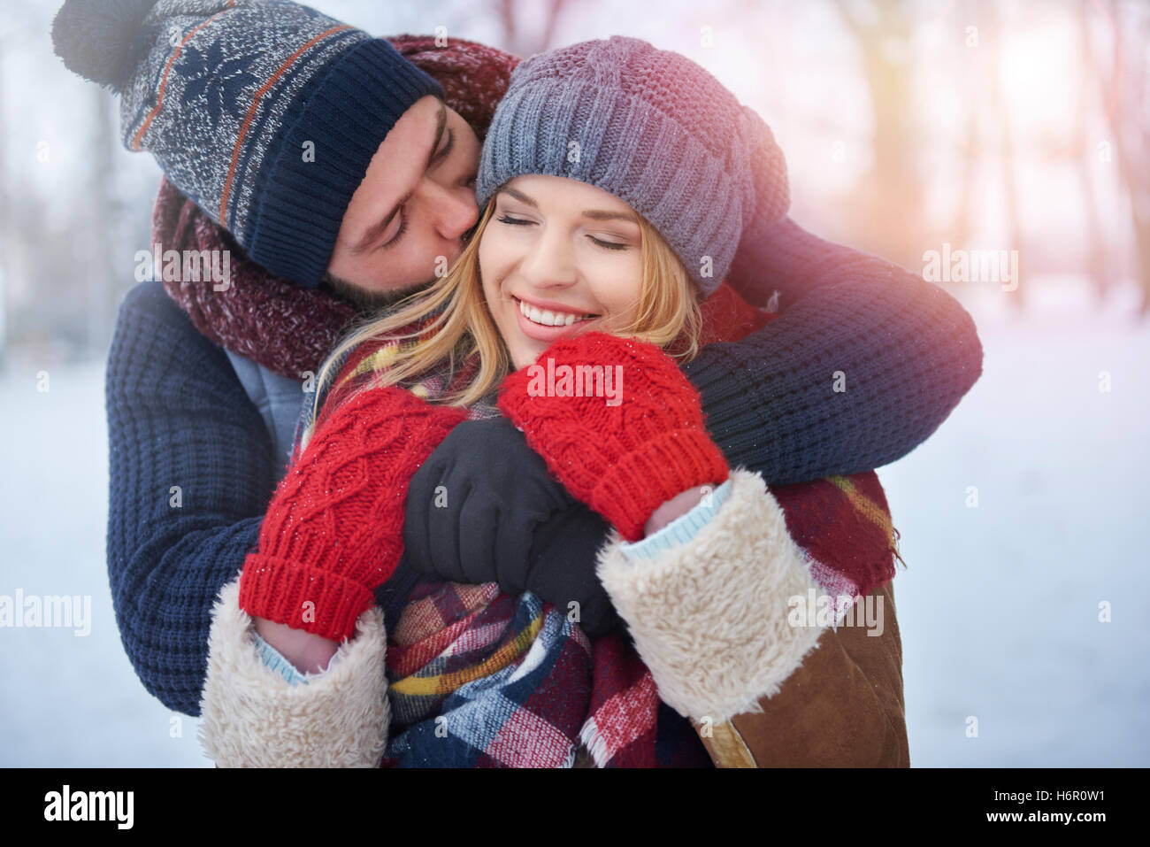 Warm clothes and warm embracing Stock Photo - Alamy