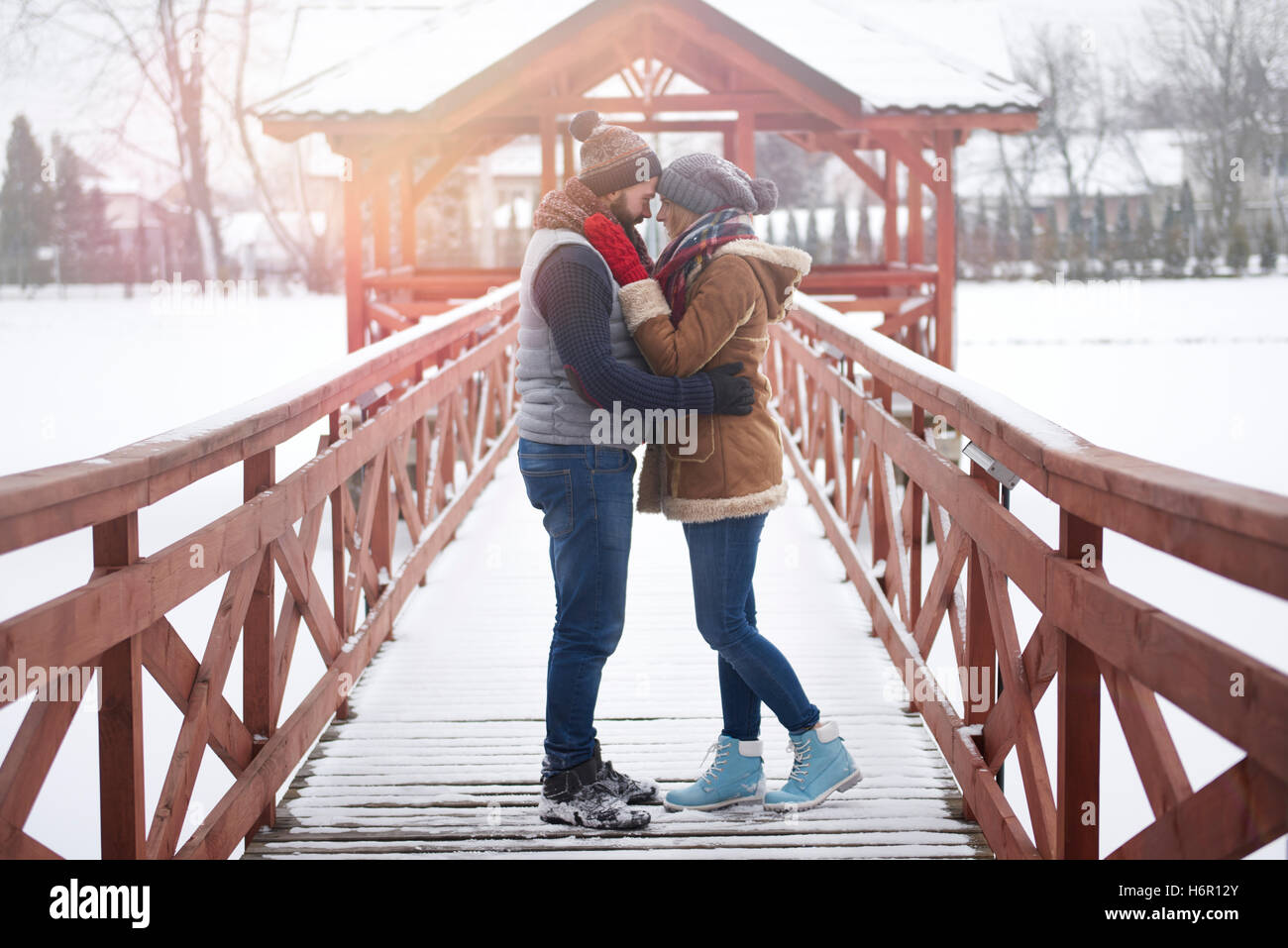 Couple standing side by side on bridge hi-res stock photography and ...
