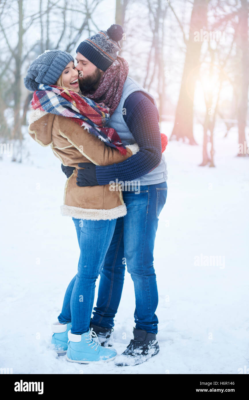 Couple kiss in snow in hi-res stock photography and images - Alamy