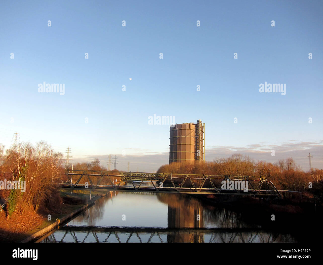 channel landscape with gasometer Stock Photo - Alamy