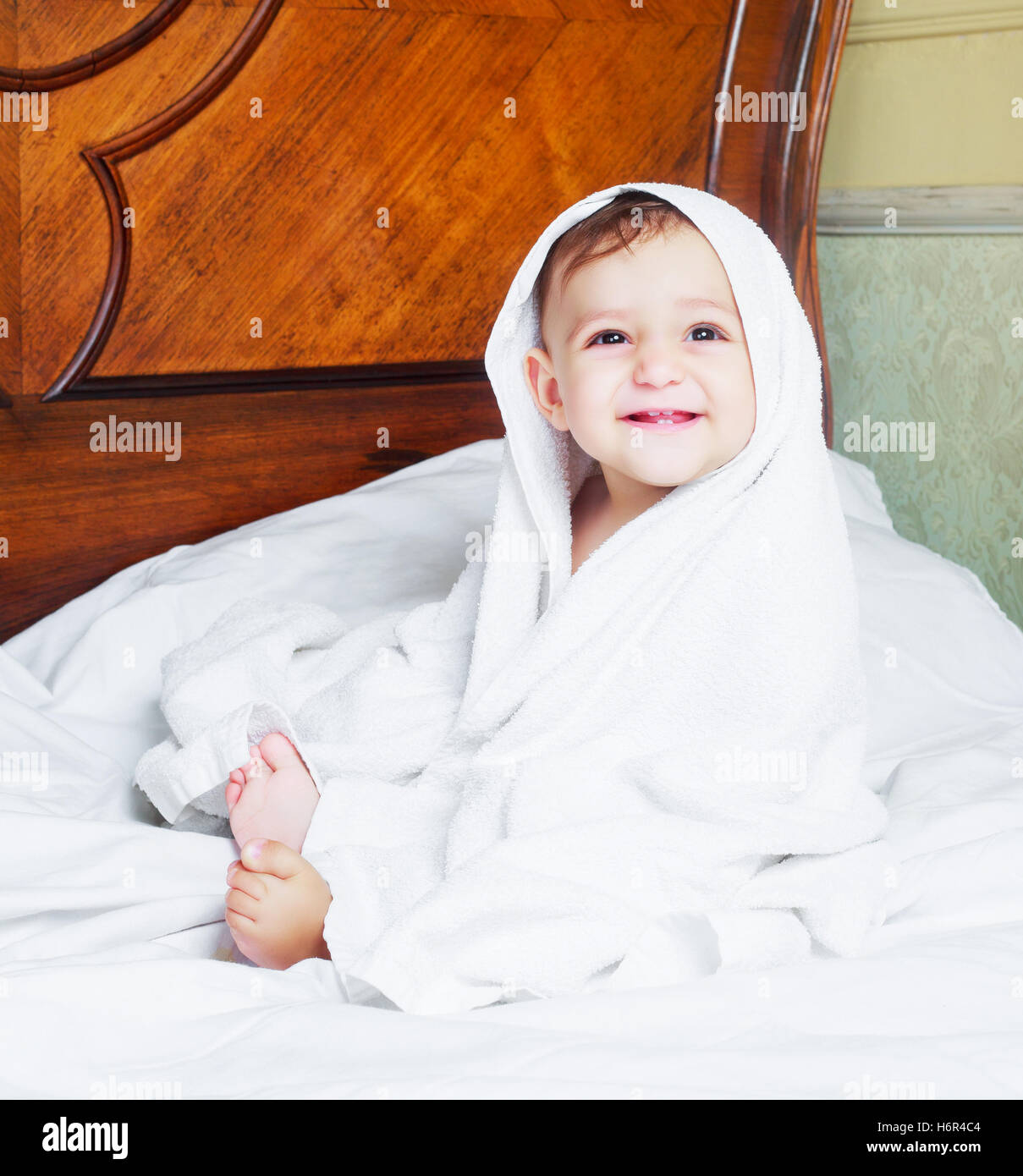 Happy child laughing alone hi-res stock photography and images - Alamy