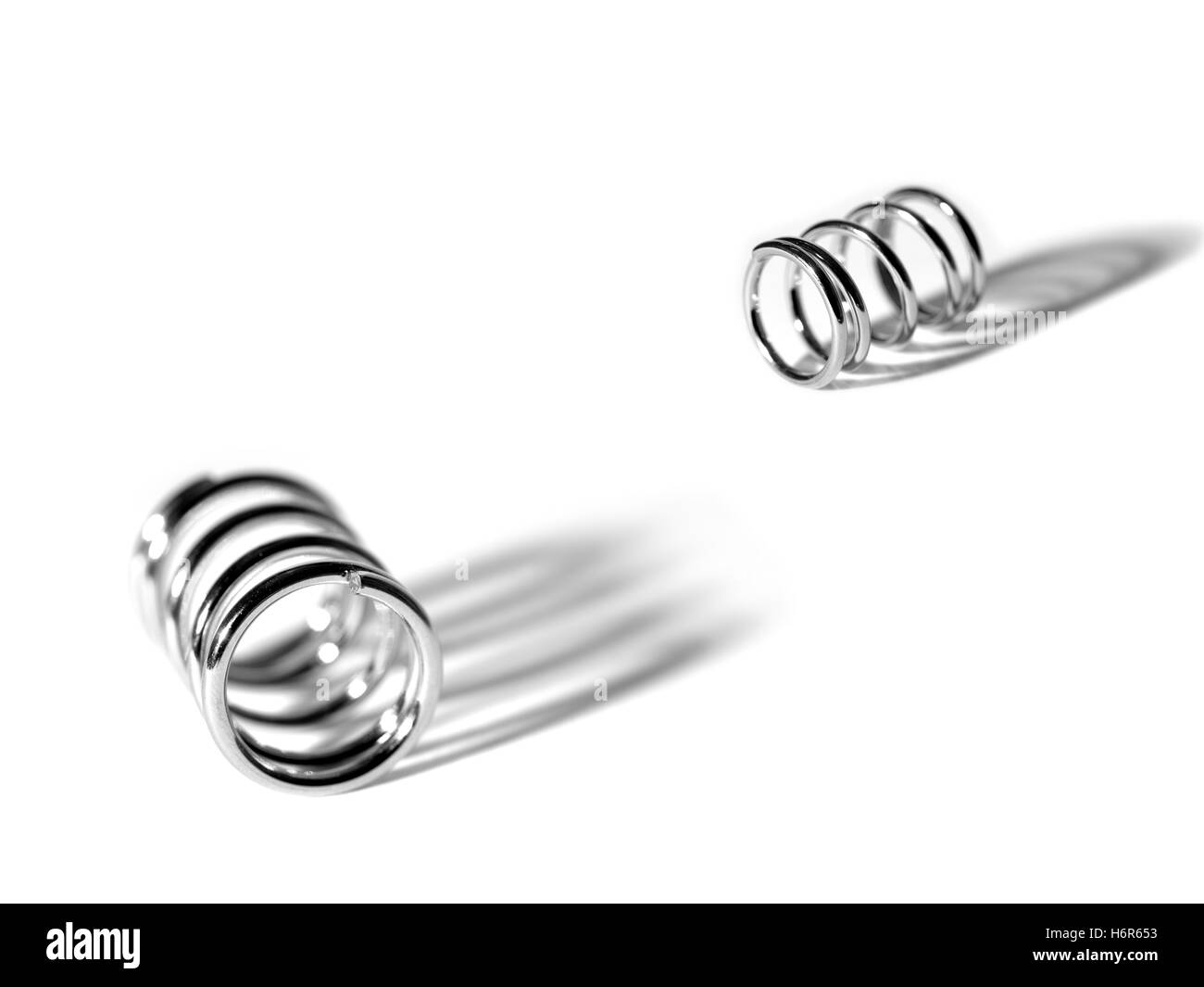 close tool component isolated industrial hardware iron spring bouncing ...