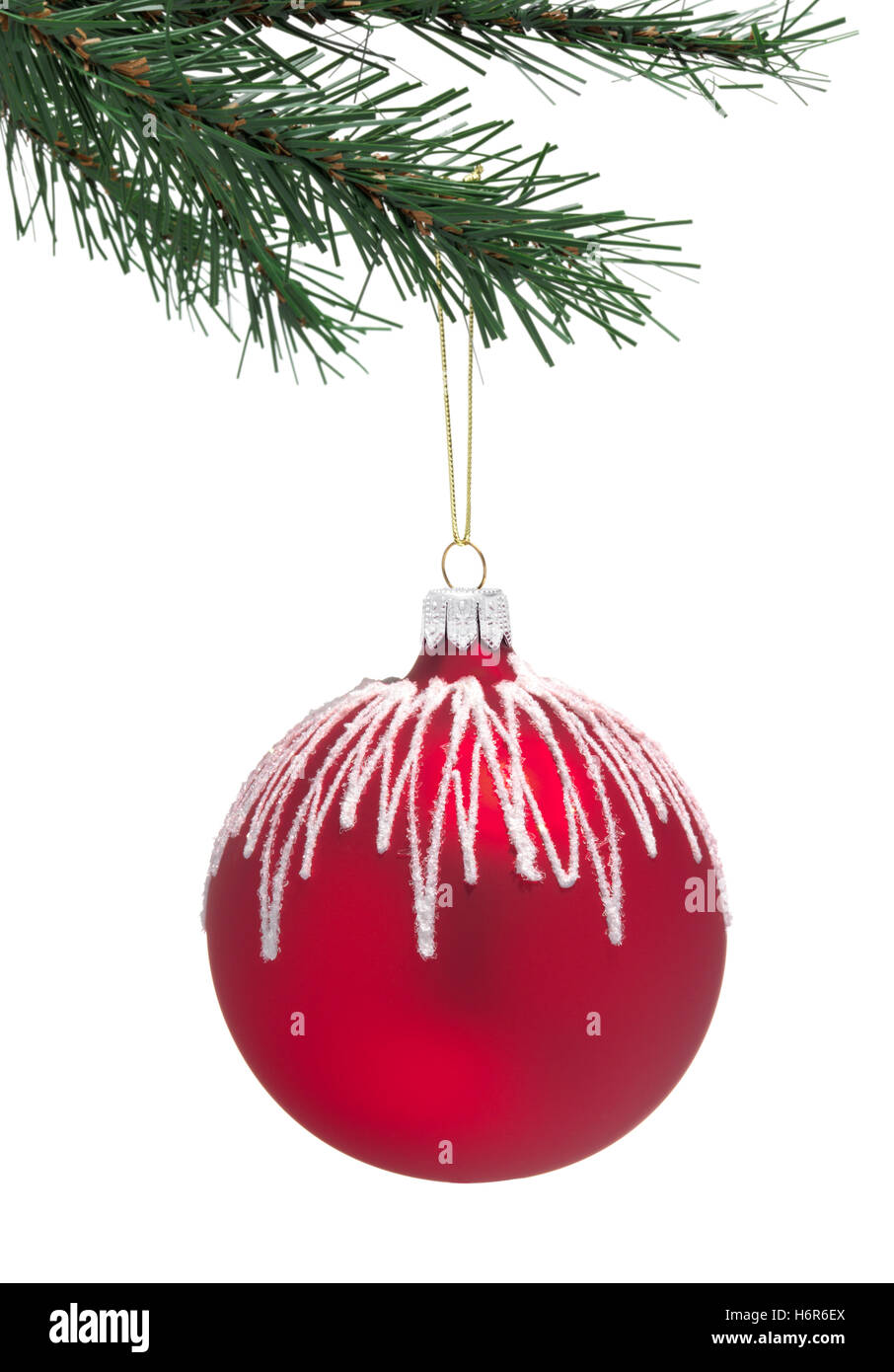 Red Bauble hanging from a Christmas tree Stock Photo - Alamy
