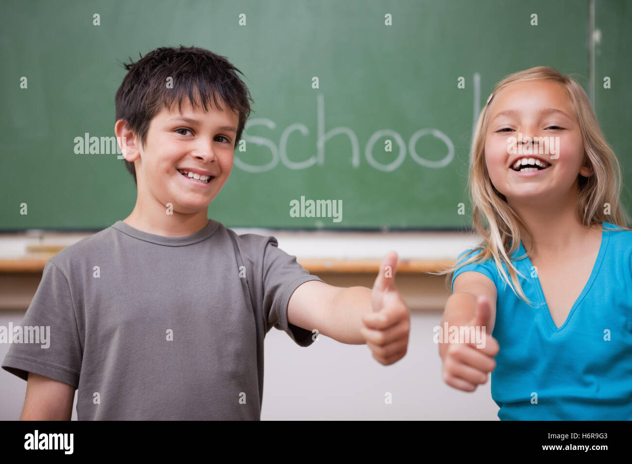 Two pupils blackboard hi-res stock photography and images - Alamy