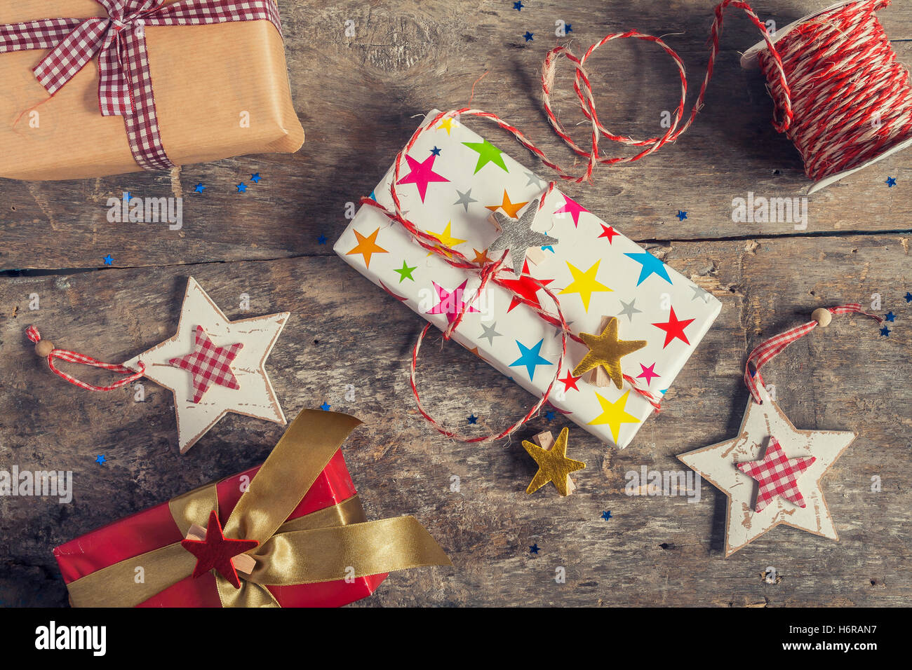 process of packing holiday gifts with effect instagram Stock Photo - Alamy