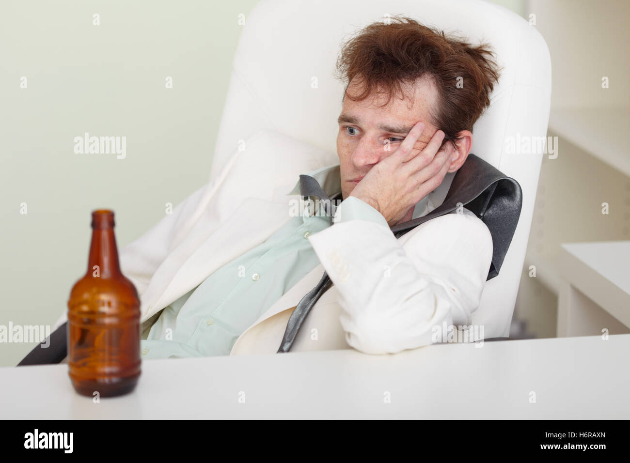 Studio portrait male hungover hi-res stock photography and images - Alamy