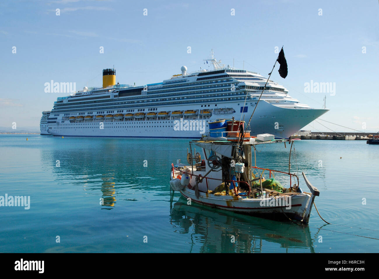 cruise ship and fishing boat in the port of katakolon Stock Photo - Alamy