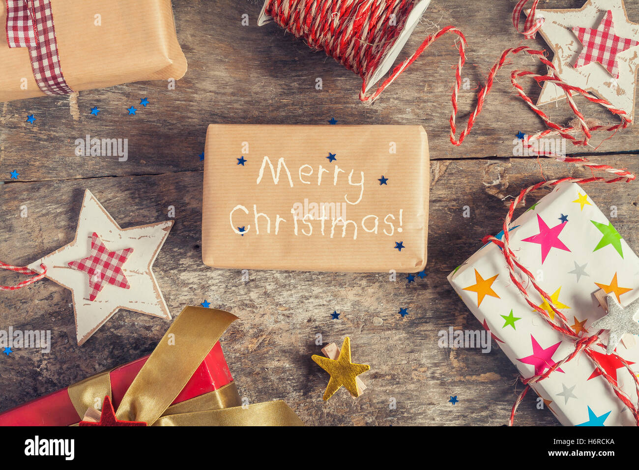 process of packing holiday gifts with effect instagram Stock Photo - Alamy