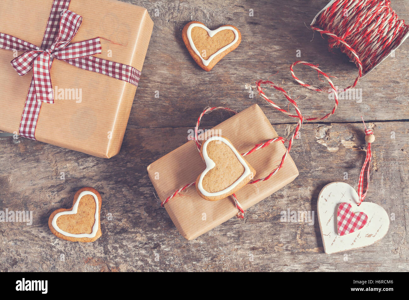 process of packing holiday gifts with effect instagram Stock Photo - Alamy