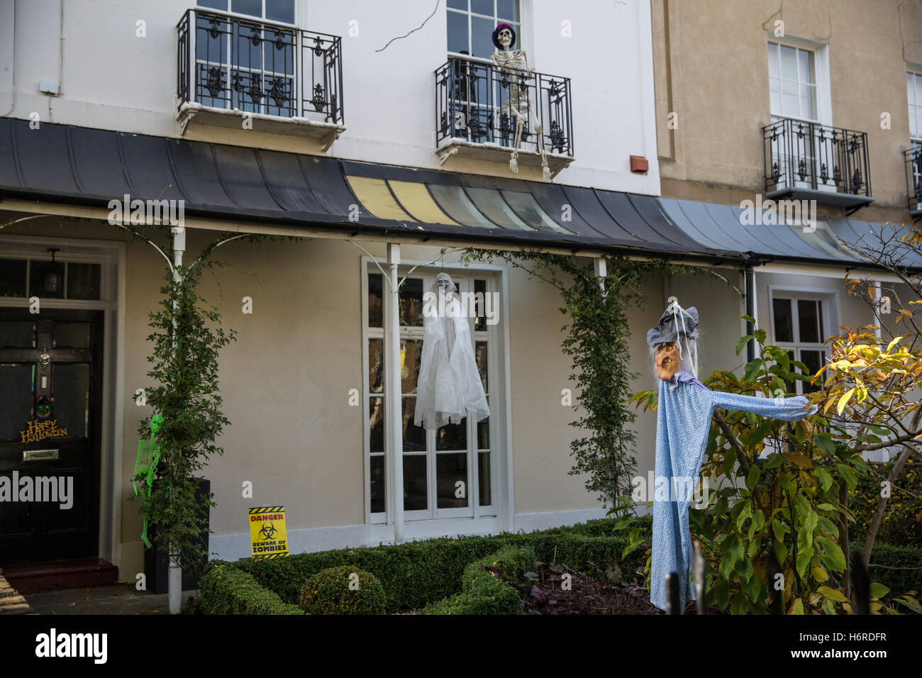 Windsor, UK. 31st October, 2016. Witches and a skeleton outside a house ...