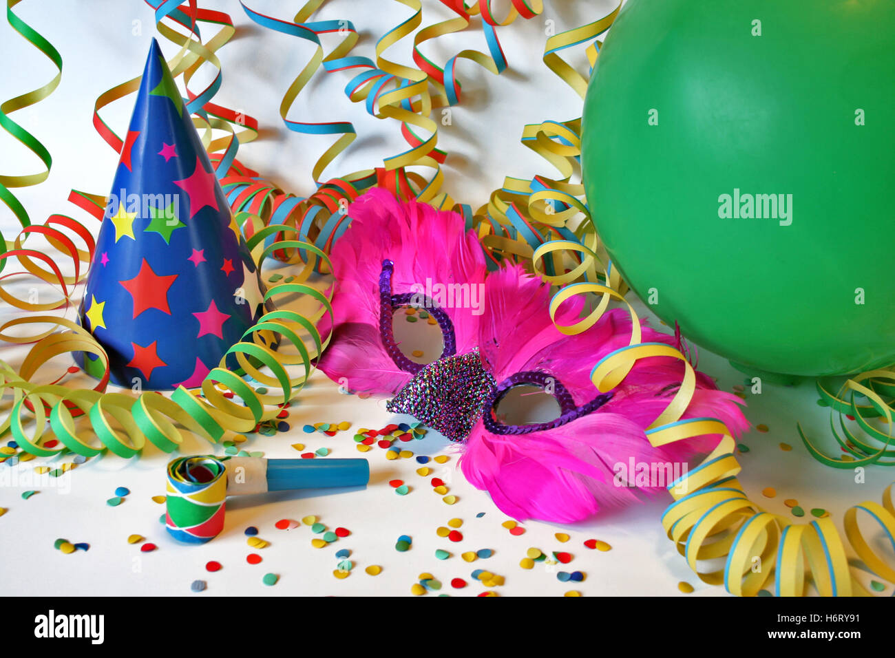 Red confetti trumpet hi-res stock photography and images - Alamy