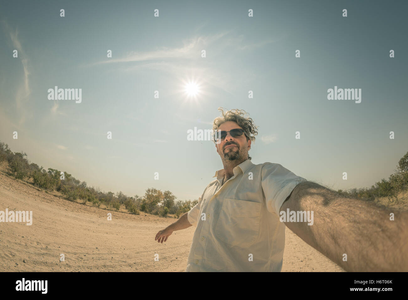 Adult man taking selfie in the Namib desert, Namib Naukluft National ...