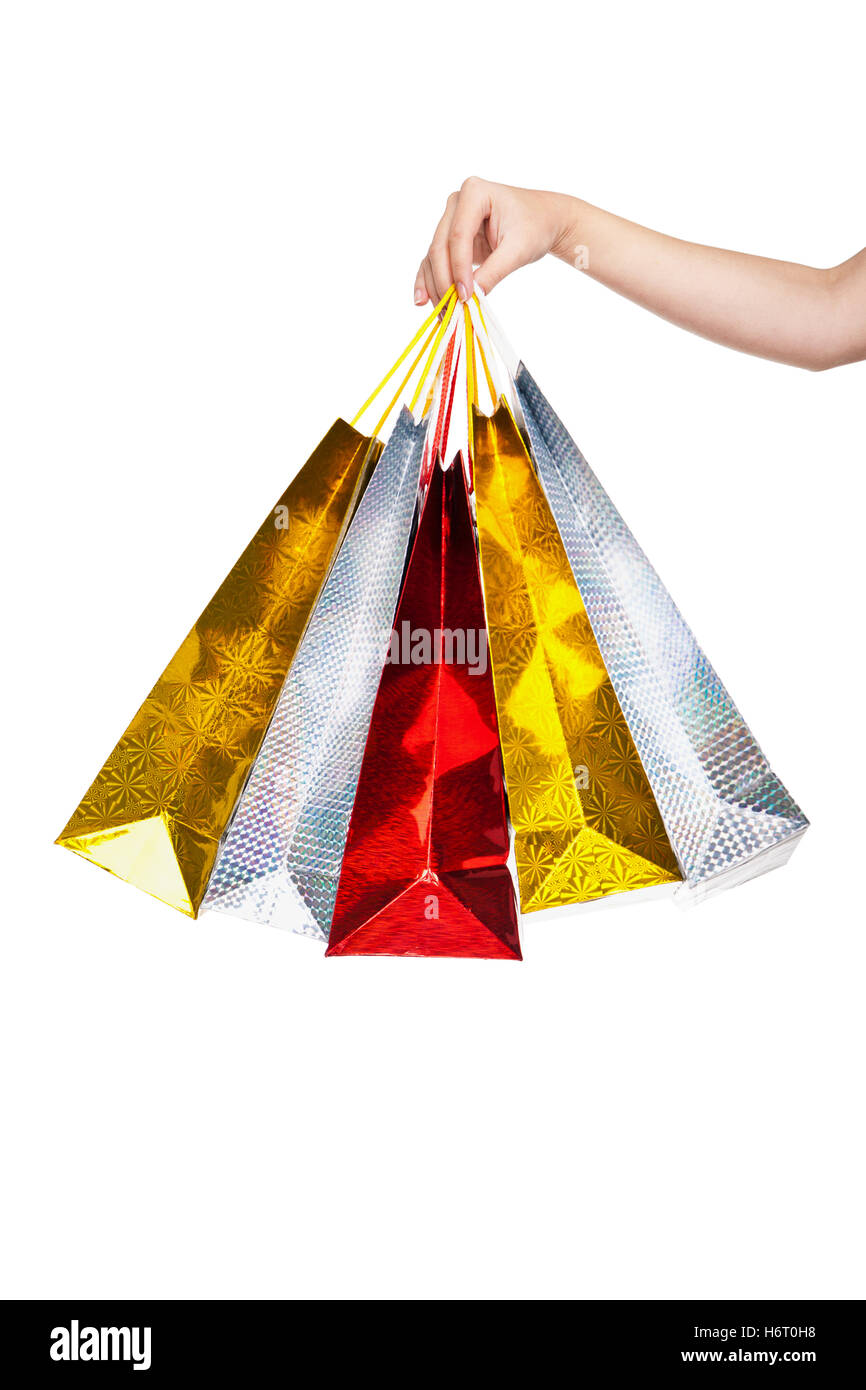 Girl holding paper bags Cut Out Stock Images & Pictures - Alamy