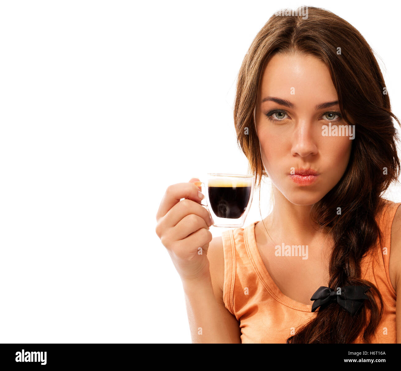 angry young woman with a cup of espresso coffee Stock Photo - Alamy