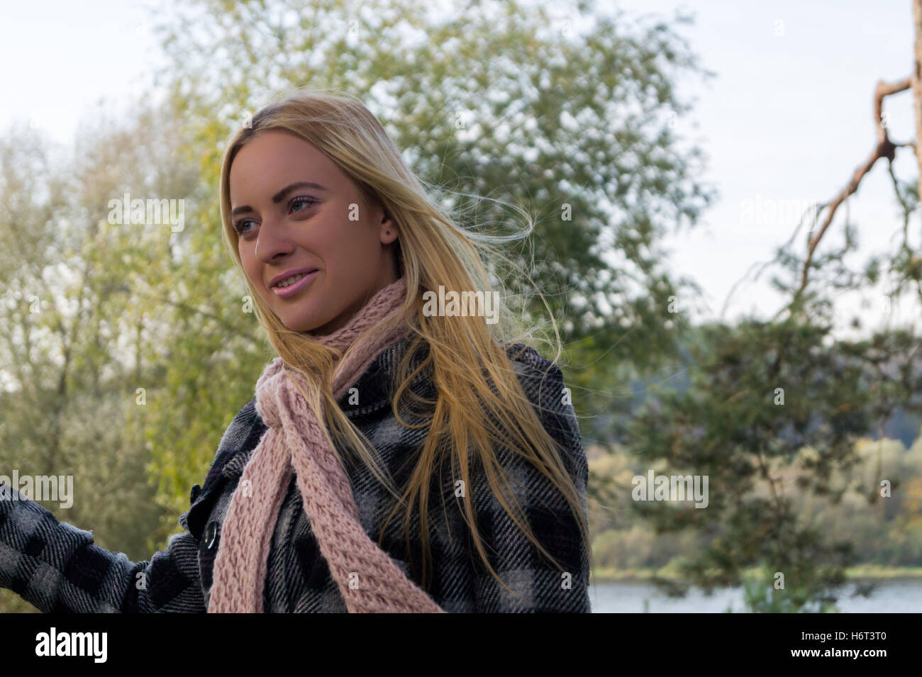 Smiling blonde girl. Portrait of happy cheerful beautiful young woman ...