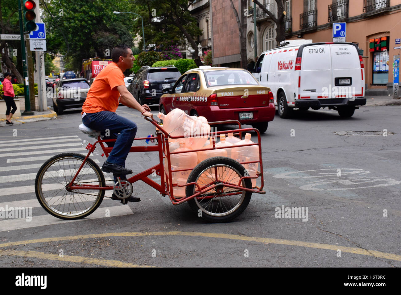 Man delivering water in Mexico City, Mexico Stock Photo - Alamy