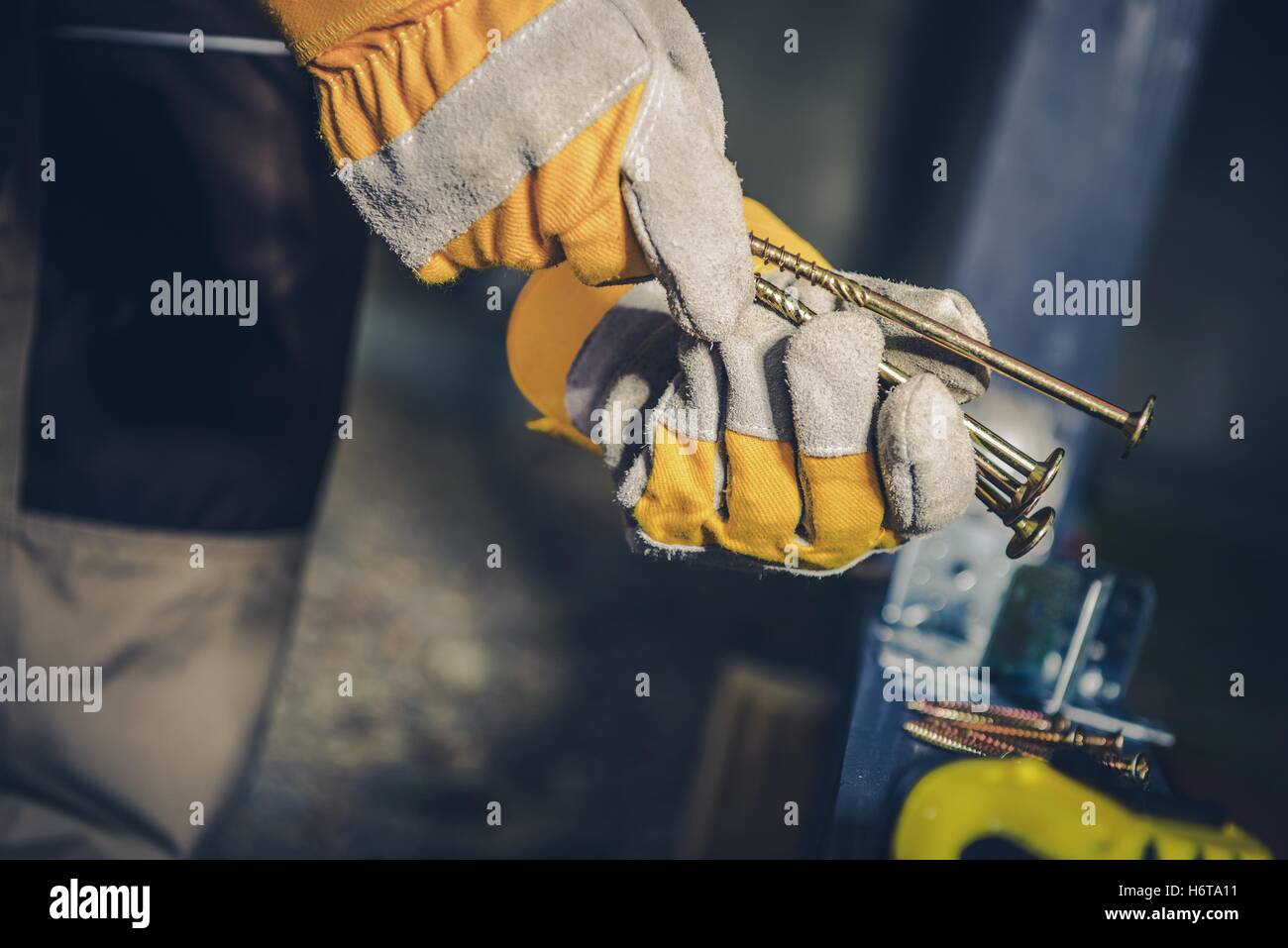 Choosing Right Screws. Construction Worker with Screws in Hands Stock ...