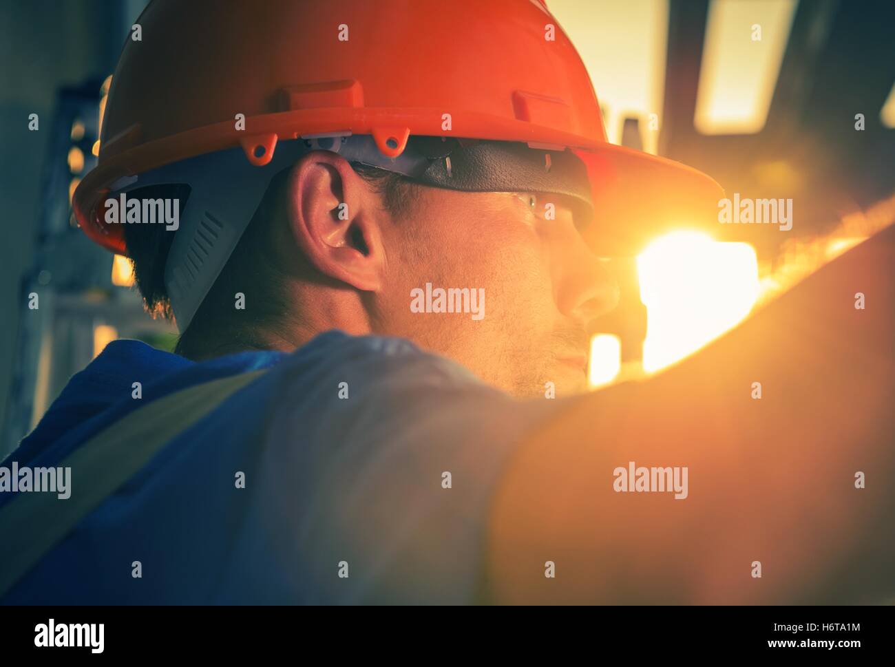 Construction Worker in the Sun. Caucasian Worker in His 30s Wearing Red ...