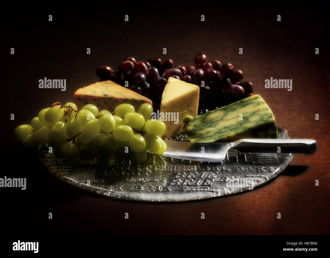 Grapes and cheese still life Stock Photo - Alamy