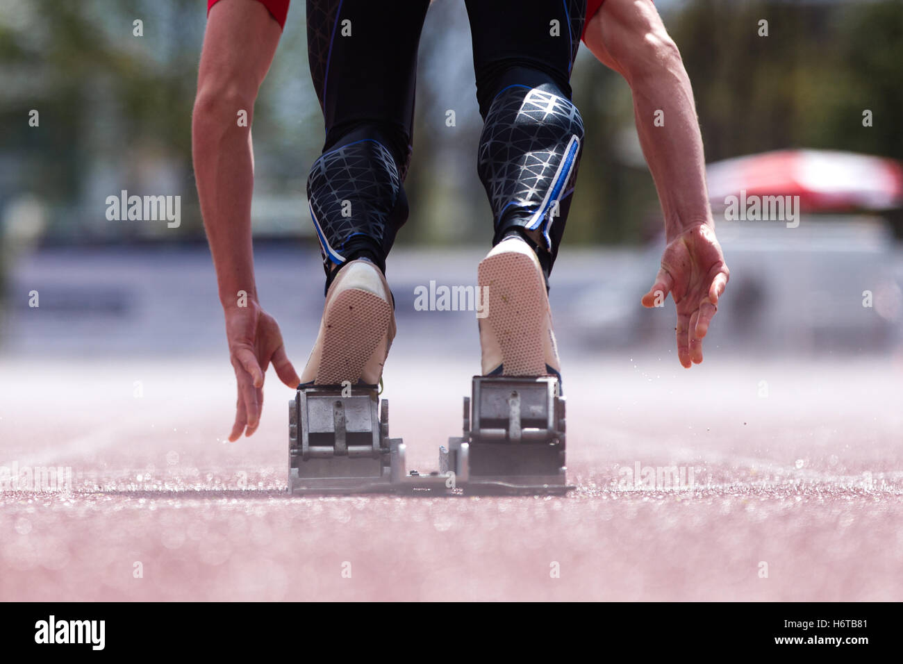 Athletic starting block runners hi-res stock photography and images - Alamy