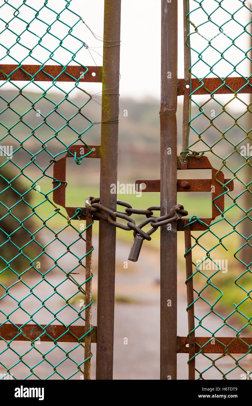 Padlocked gates hi-res stock photography and images - Alamy