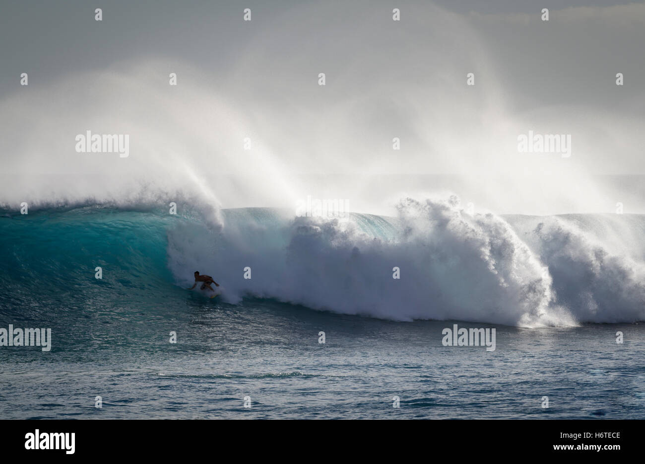 A surfer rides in the barrel of this wave, Oahu Hawaii USA Stock Photo ...