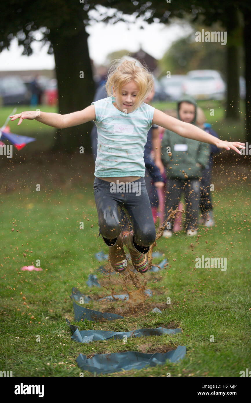 Youngsters taking part in the World Puddle Jumping Contest held at ...