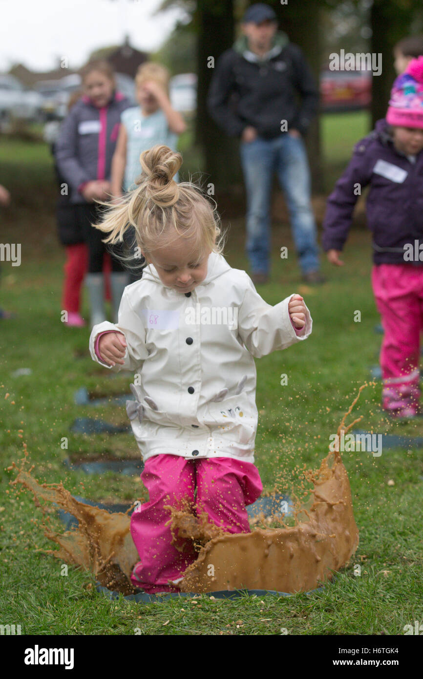 Youngsters taking part in the World Puddle Jumping Contest held at ...