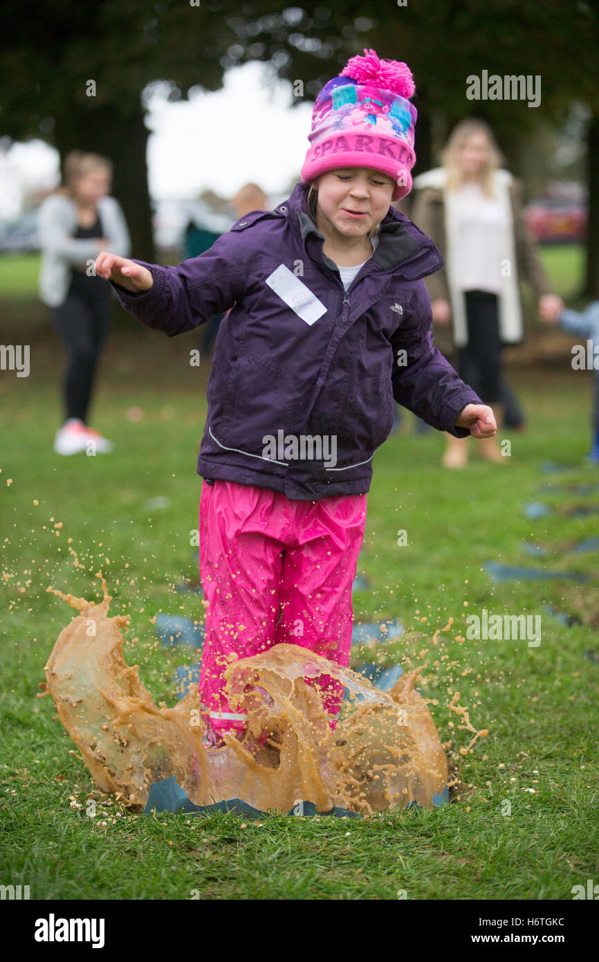 Youngsters taking part in the World Puddle Jumping Contest held at ...