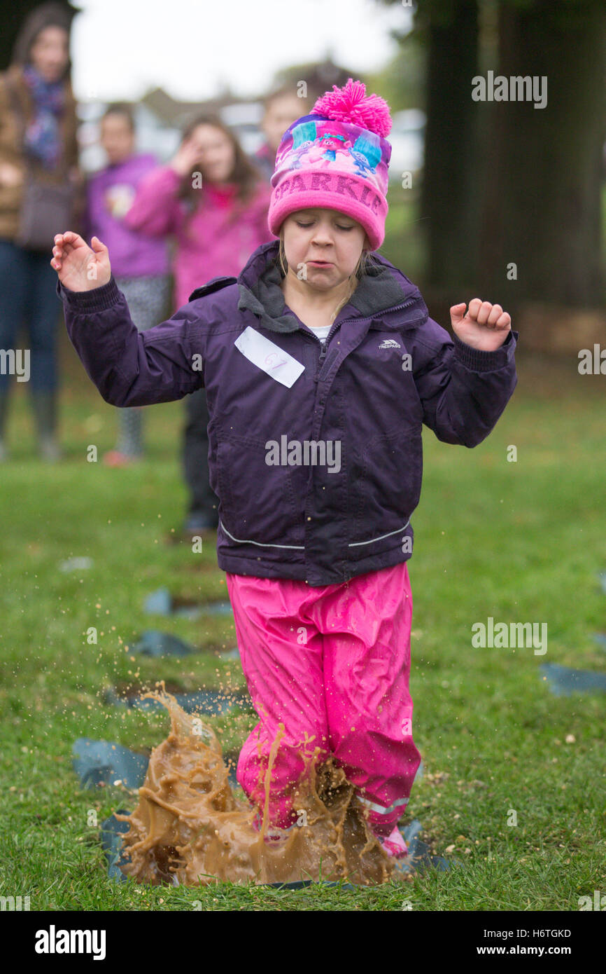 Youngsters taking part in the World Puddle Jumping Contest held at ...