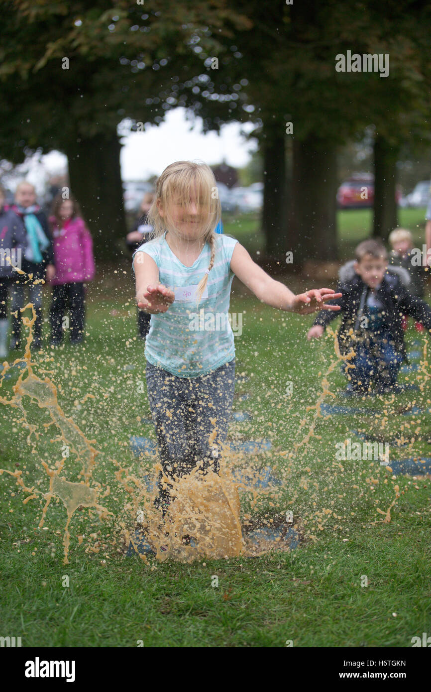 Youngsters taking part in the World Puddle Jumping Contest held at ...