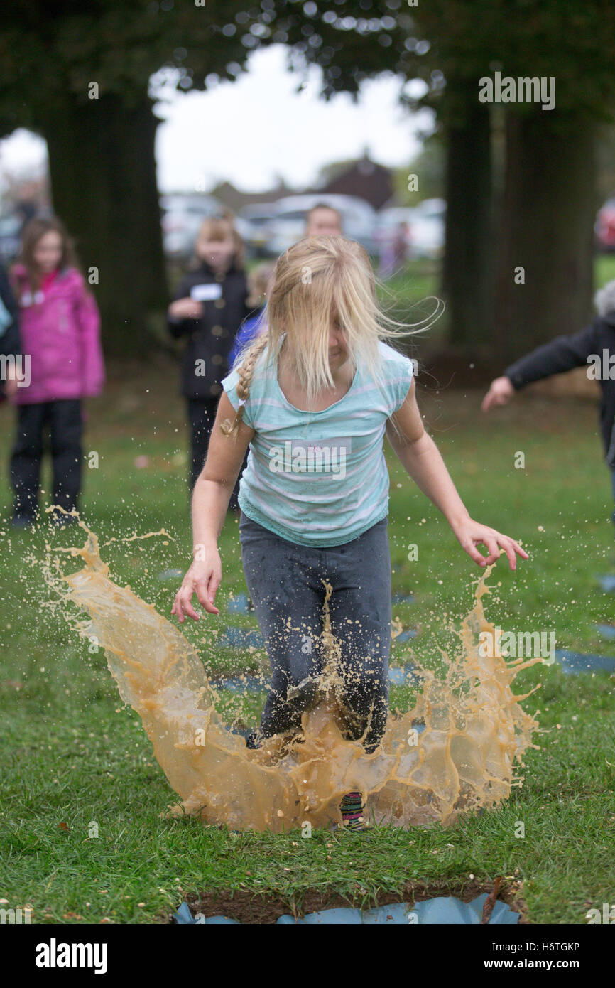 Youngsters taking part in the World Puddle Jumping Contest held at ...