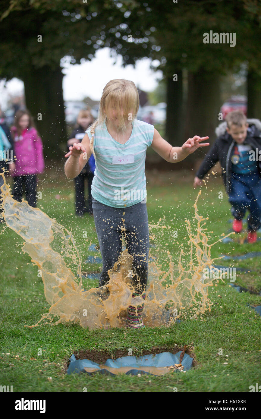 Youngsters taking part in the World Puddle Jumping Contest held at ...