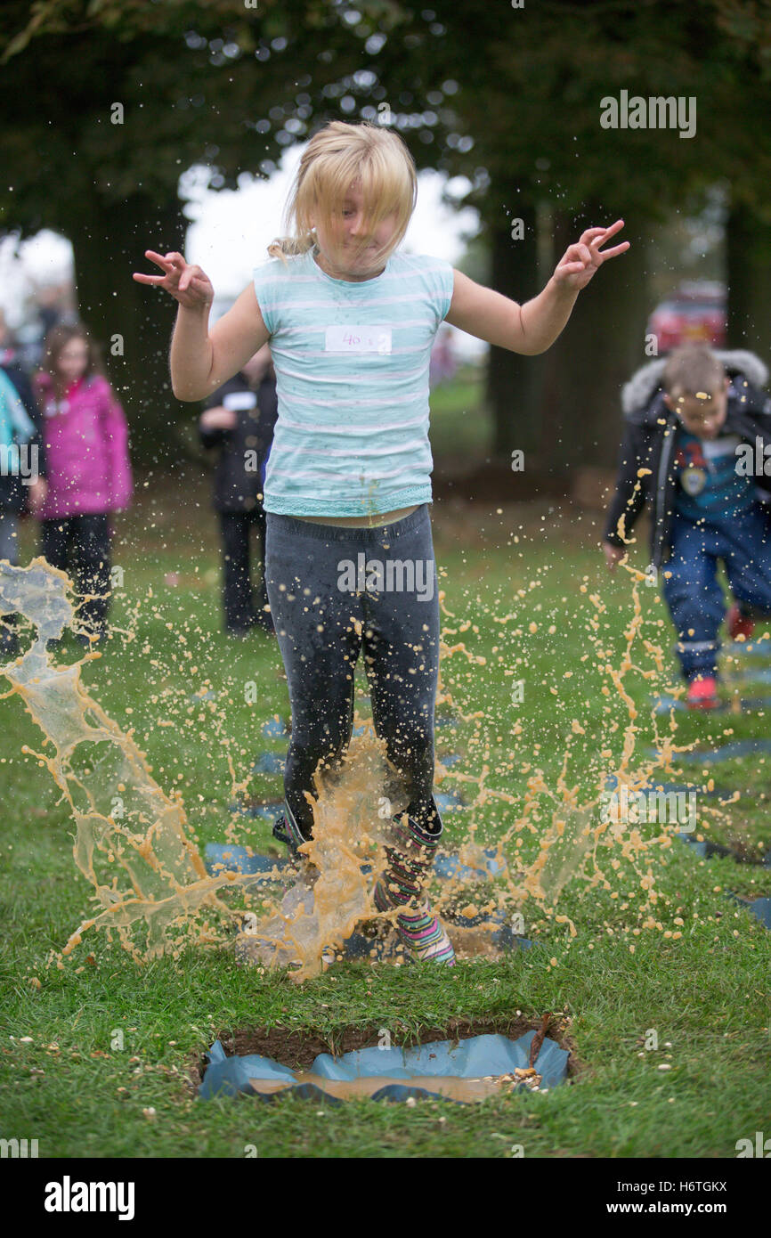 Youngsters taking part in the World Puddle Jumping Contest held at ...