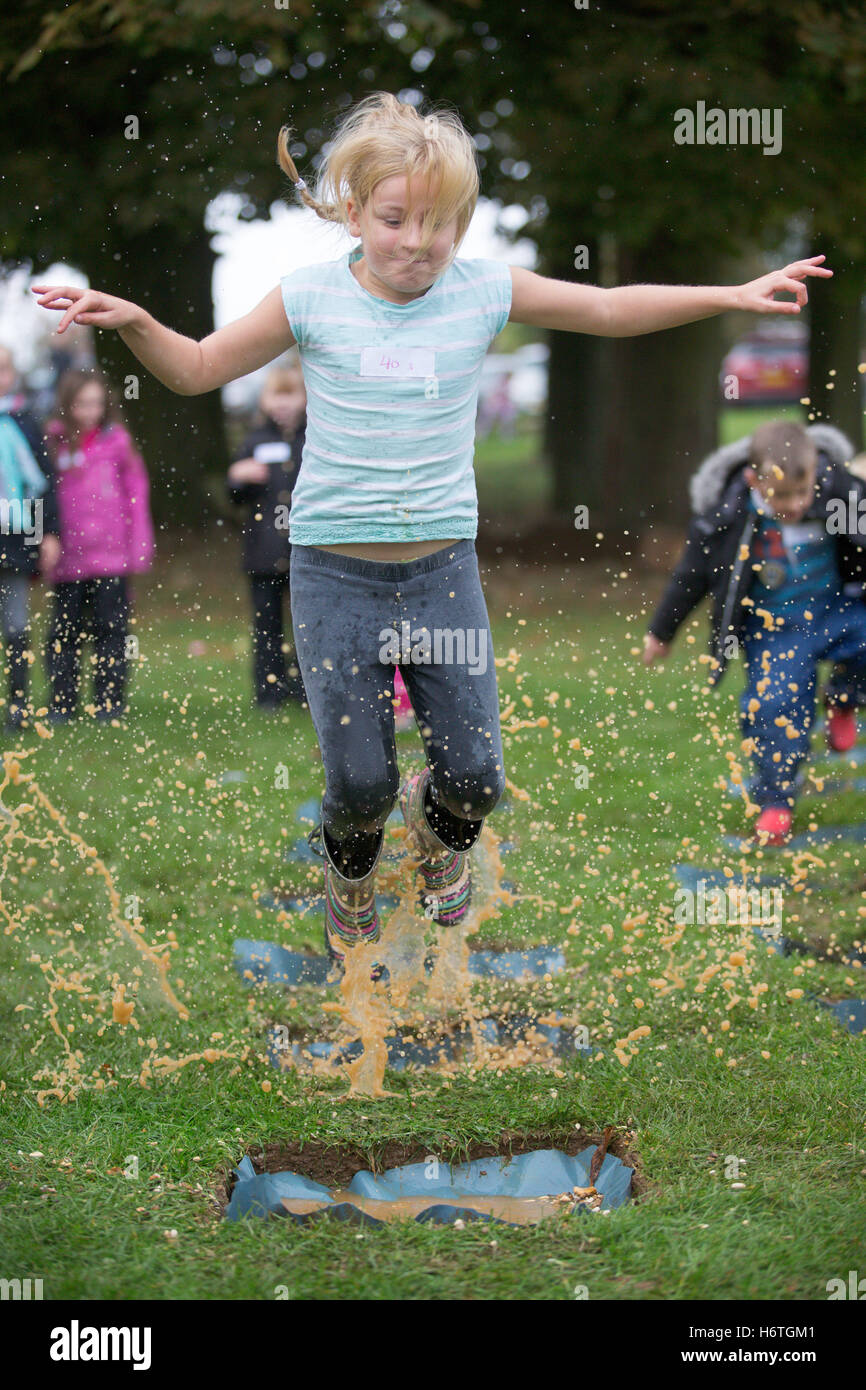 Youngsters taking part in the World Puddle Jumping Contest held at ...