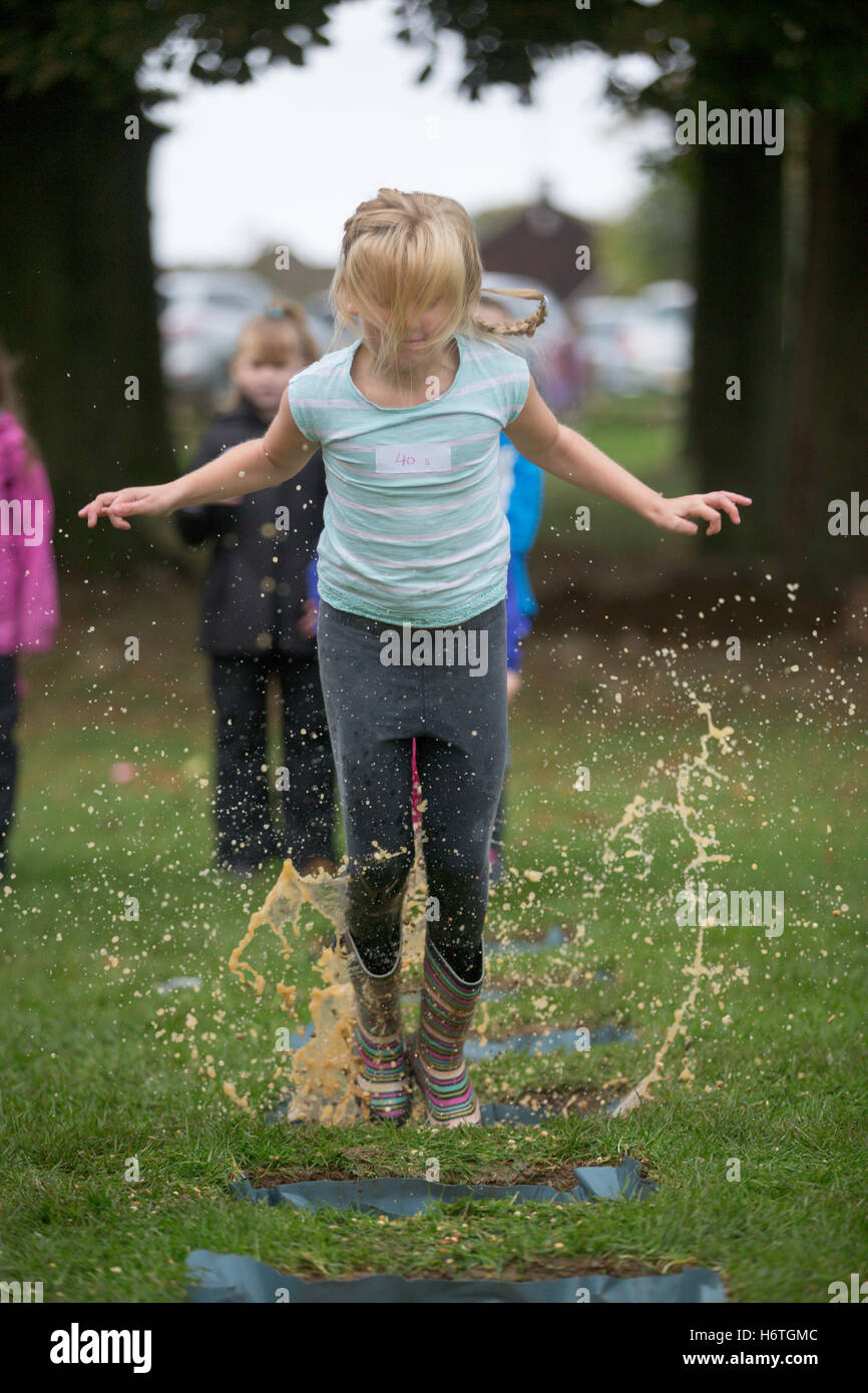Youngsters taking part in the World Puddle Jumping Contest held at ...