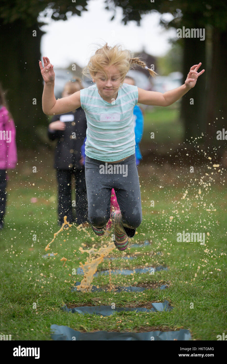 Youngsters taking part in the World Puddle Jumping Contest held at ...