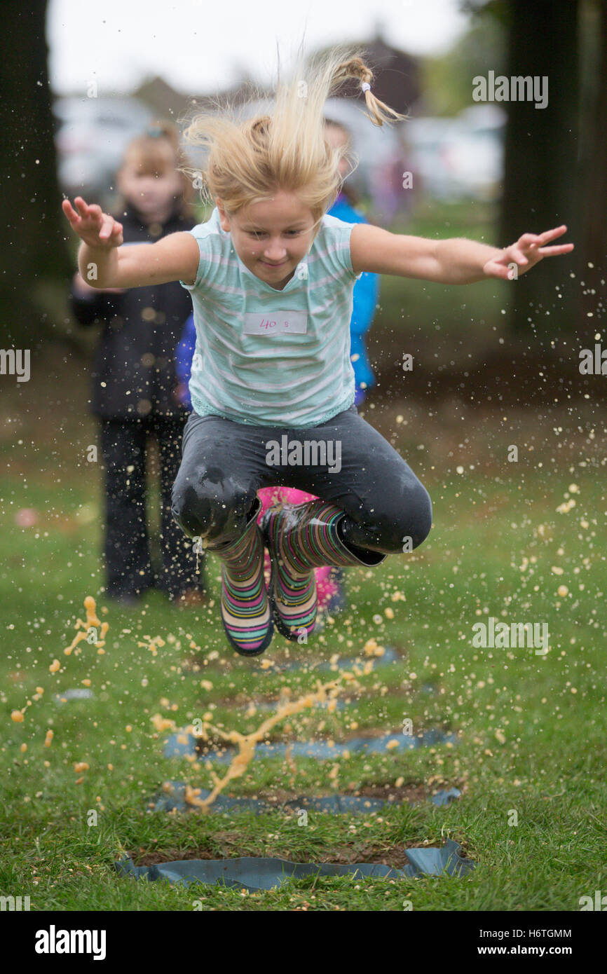 Youngsters taking part in the World Puddle Jumping Contest held at ...