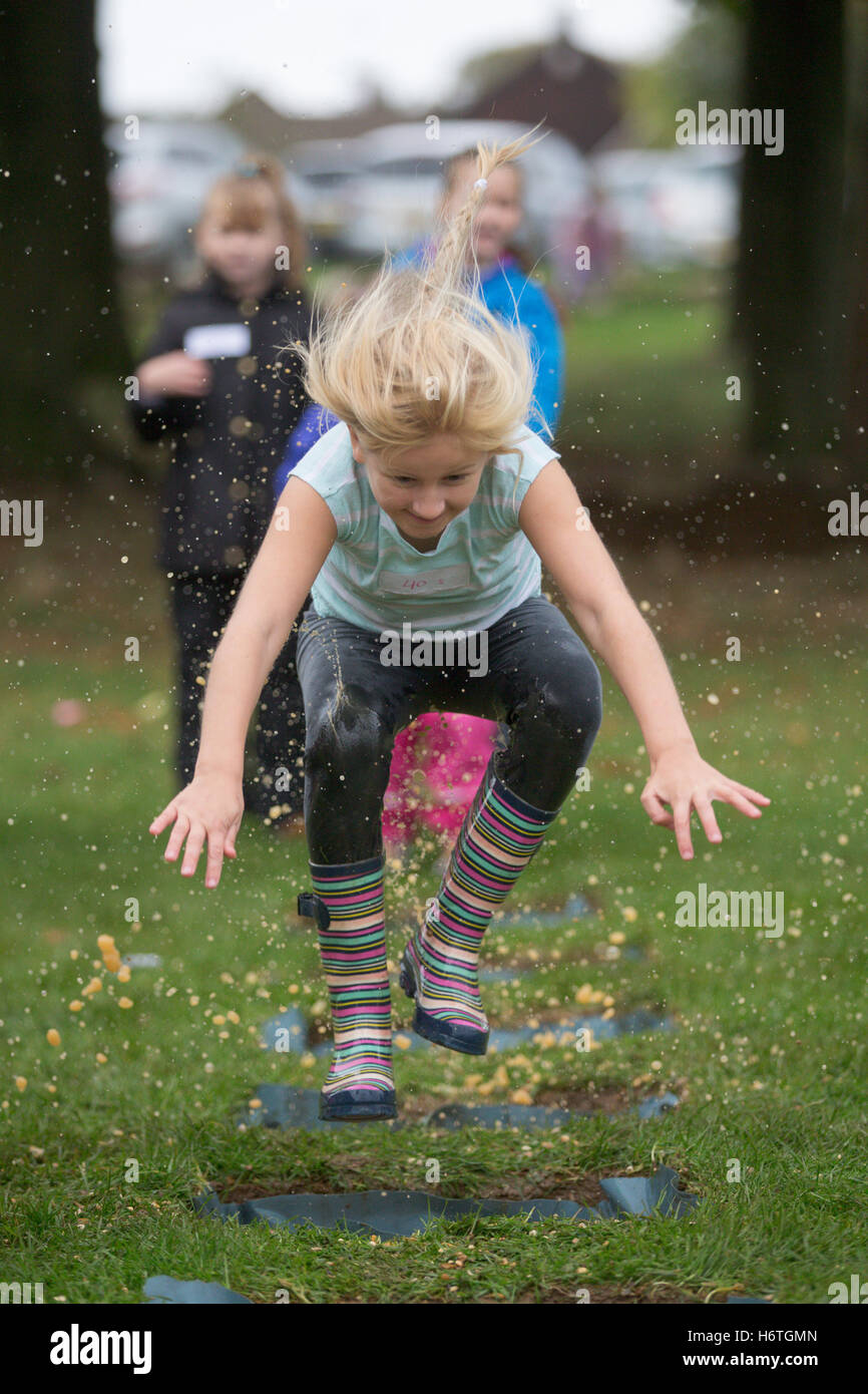 Youngsters taking part in the World Puddle Jumping Contest held at ...