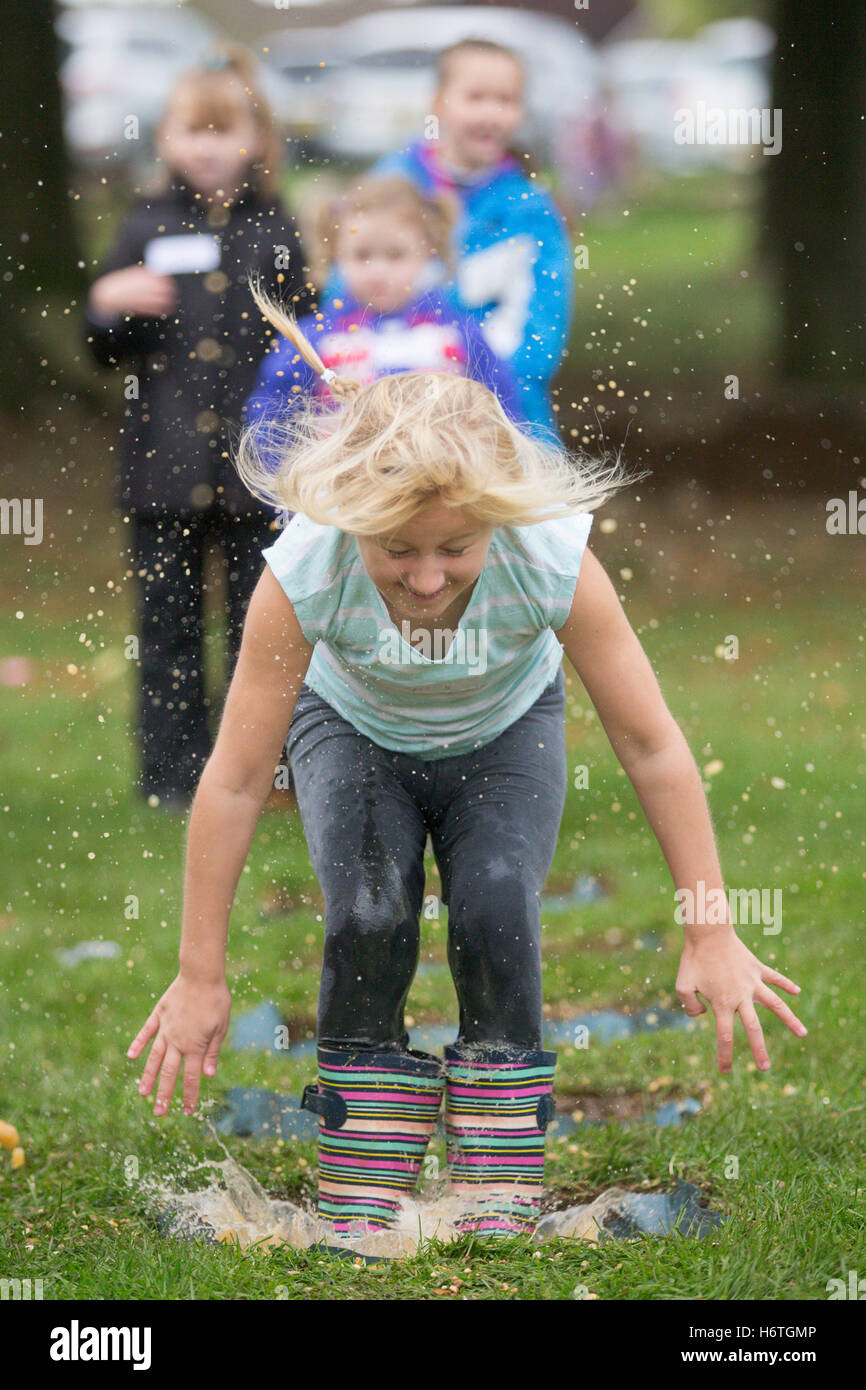 Youngsters taking part in the World Puddle Jumping Contest held at ...