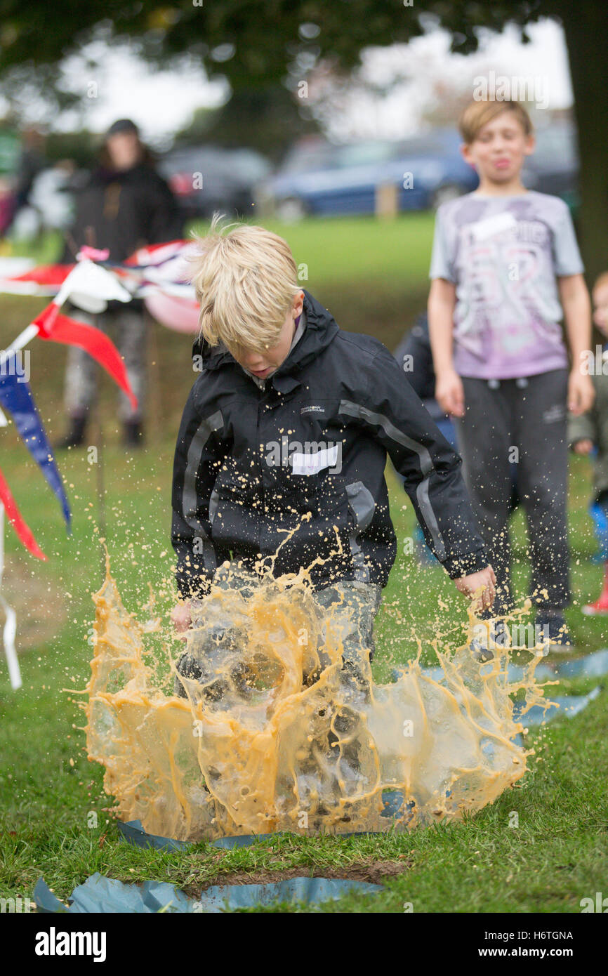 Youngsters taking part in the World Puddle Jumping Contest held at ...