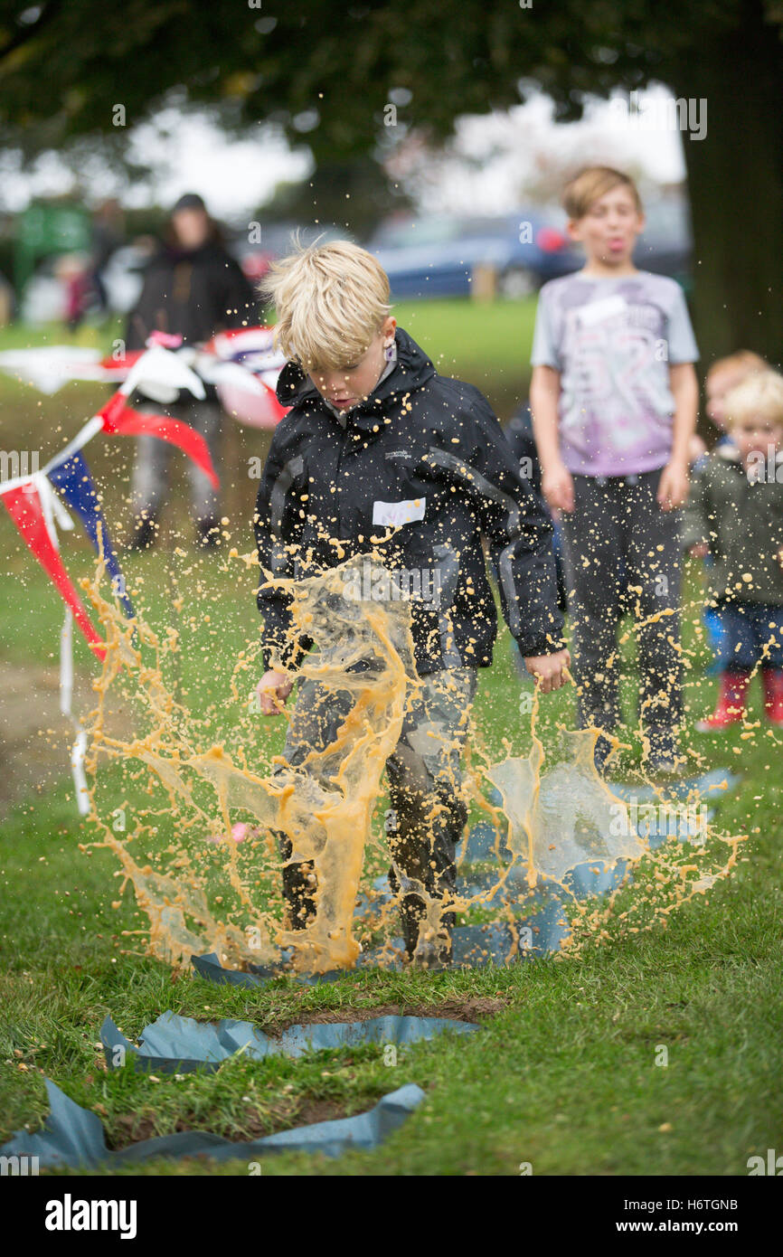 Youngsters taking part in the World Puddle Jumping Contest held at ...