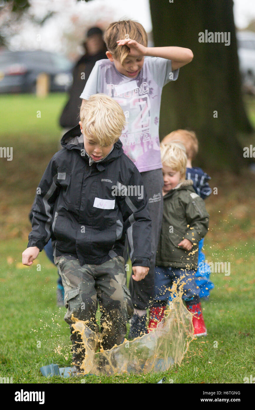 Youngsters taking part in the World Puddle Jumping Contest held at ...