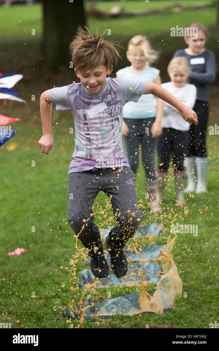 Youngsters taking part in the World Puddle Jumping Contest held at ...