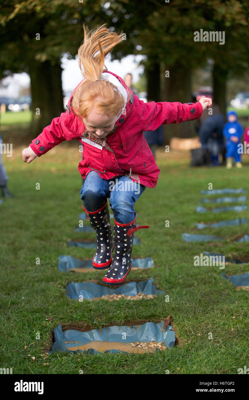 Youngsters taking part in the World Puddle Jumping Contest held at ...