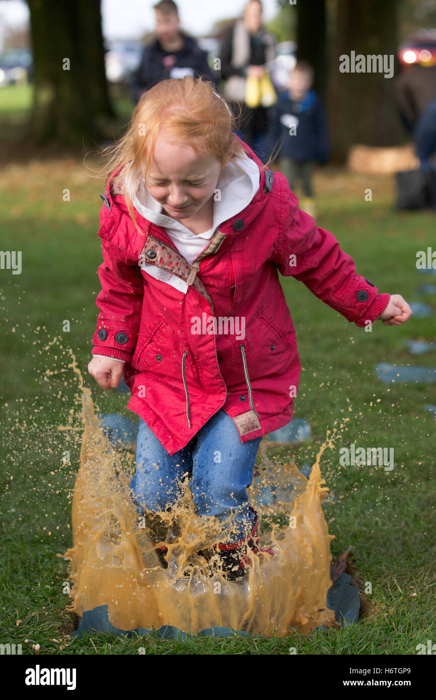 Youngsters taking part in the World Puddle Jumping Contest held at ...