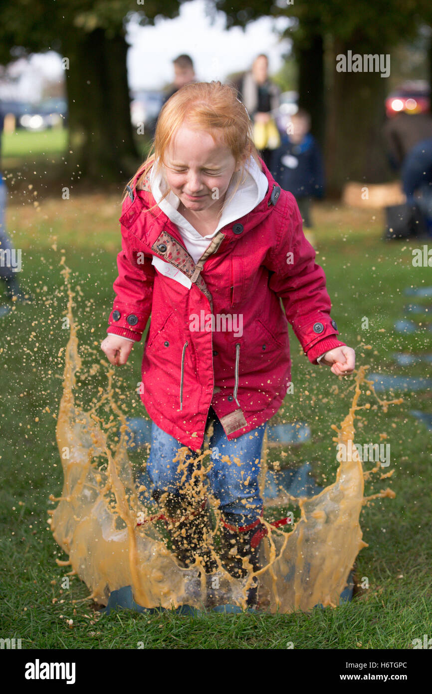 Youngsters taking part in the World Puddle Jumping Contest held at ...