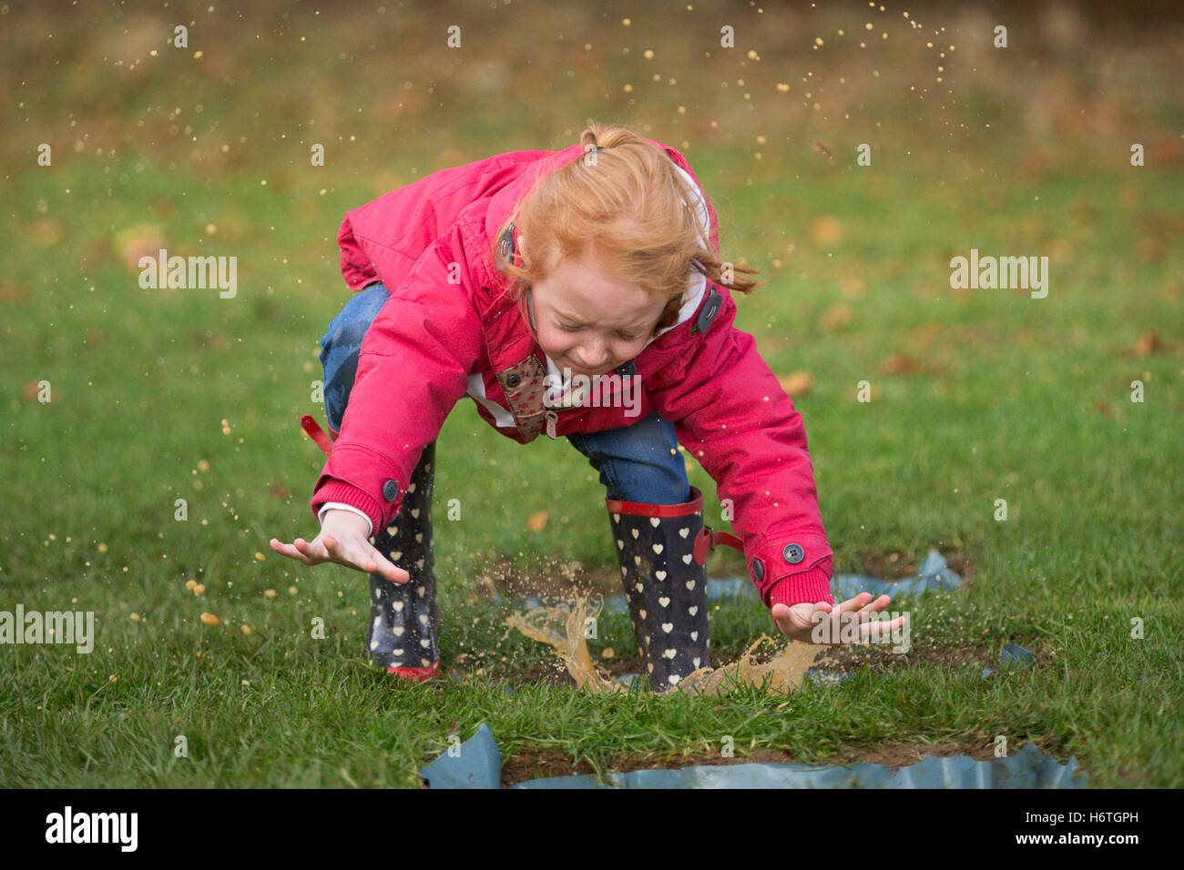 Youngsters taking part in the World Puddle Jumping Contest held at ...