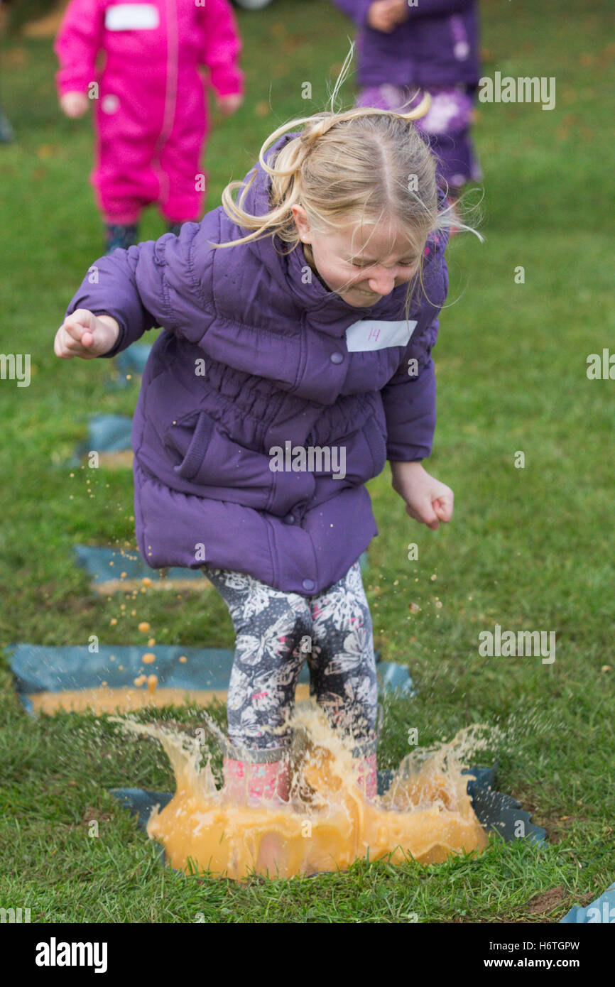 Youngsters taking part in the World Puddle Jumping Contest held at ...